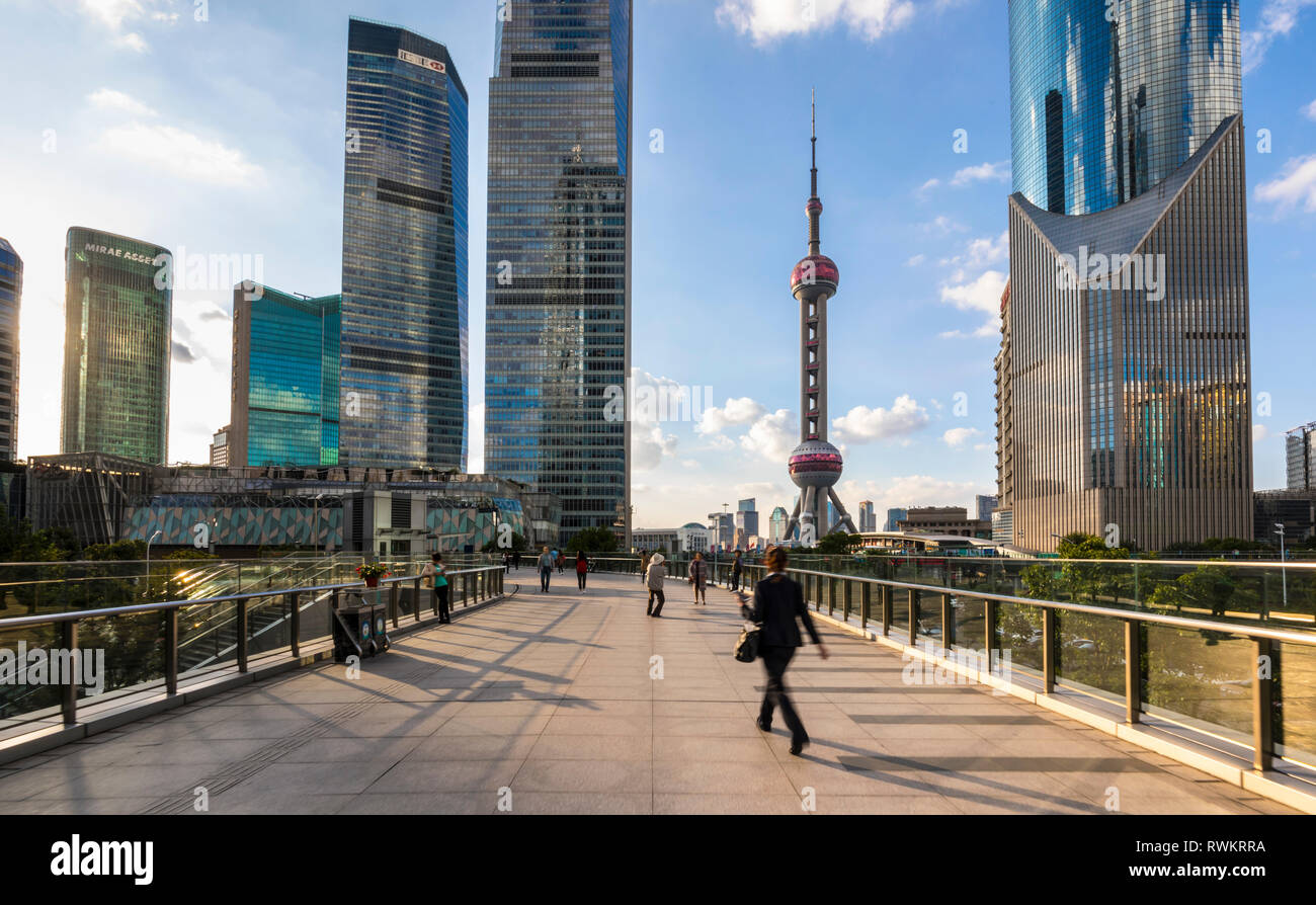 Pudong skyline with Oriental Pearl Tower from elevated walkway ...