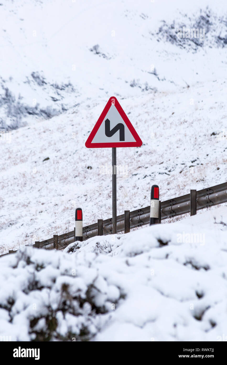 Double bend first to left sign hi-res stock photography and images - Alamy