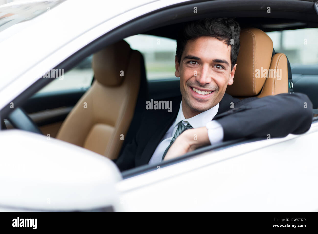 Handsome man driving his car Stock Photo - Alamy