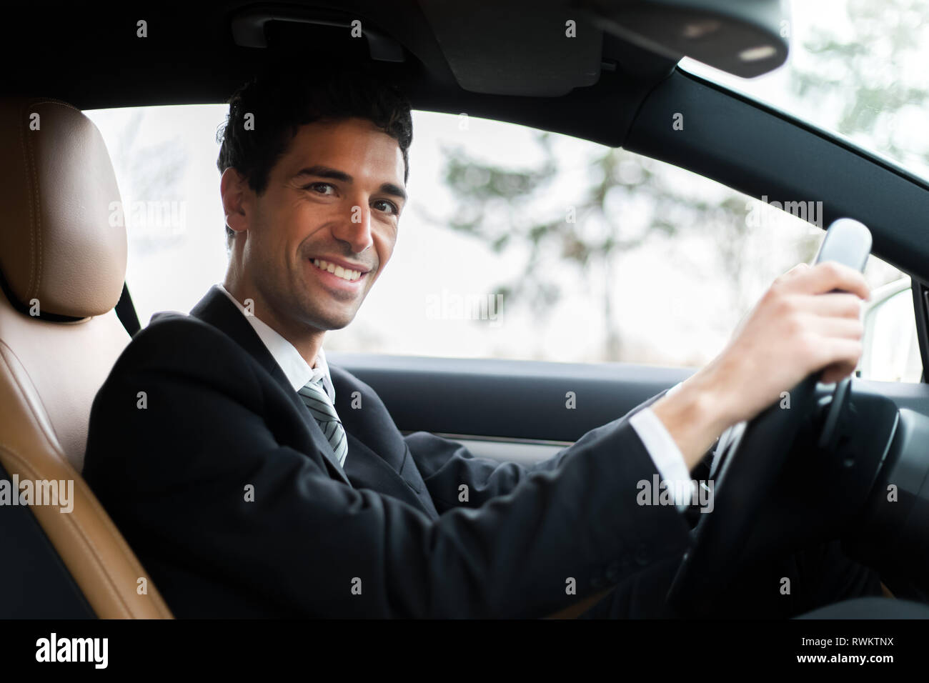 Handsome corporate man driving hi-res stock photography and images - Alamy