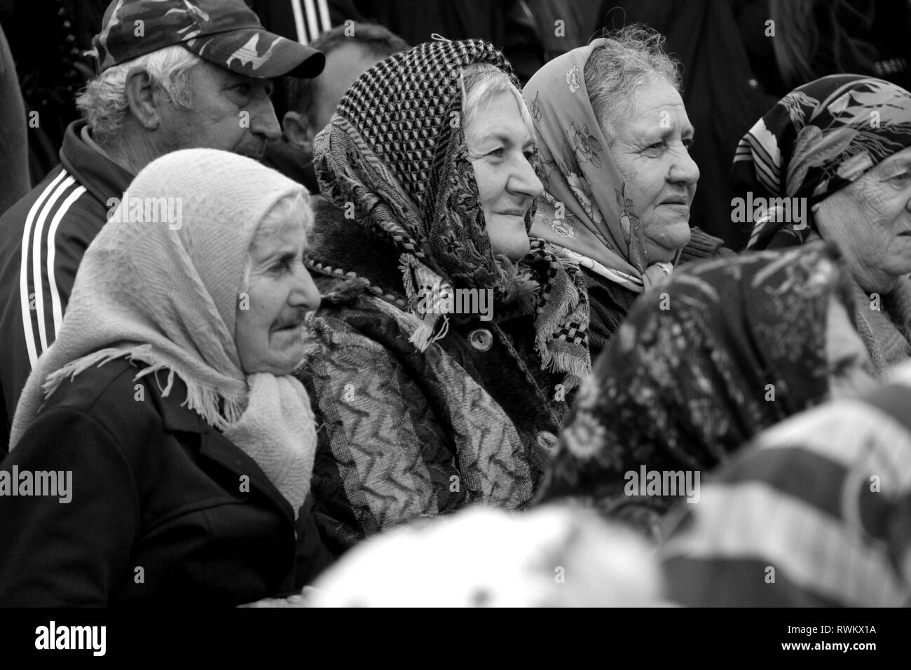Three old women sitting together Stock Photo - Alamy