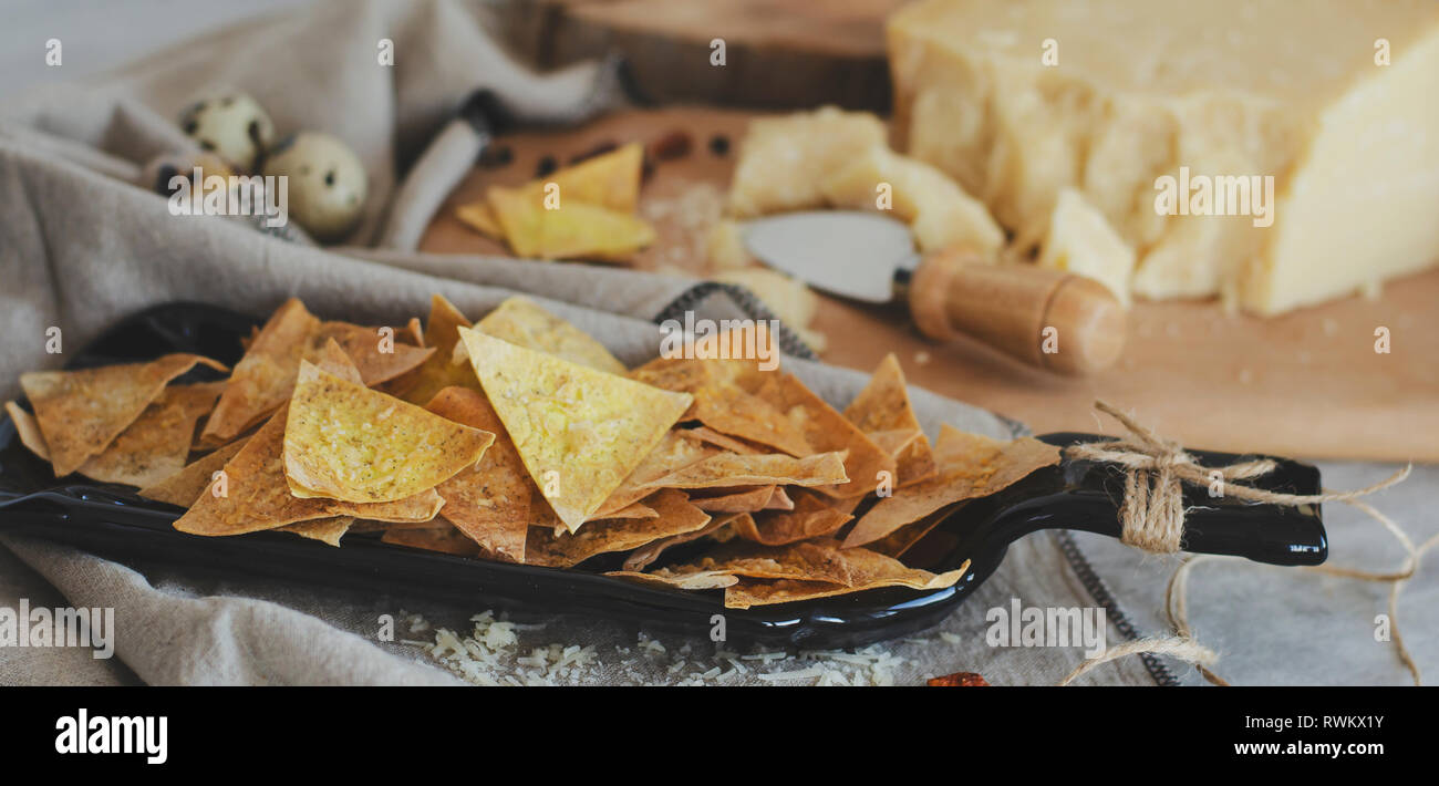 Homemade crispy chips with parmesan cheese made of Armenian flat bread ...