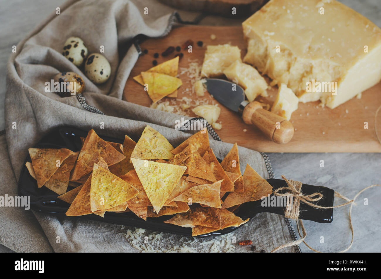 Homemade crispy chips with parmesan cheese made of Armenian flat bread ...