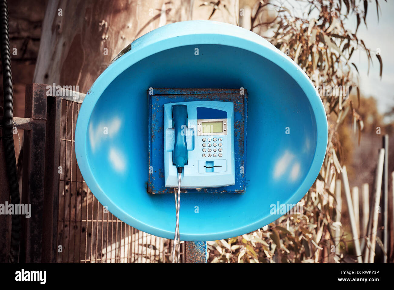 Blue spherical retro telephone booth in an outdoor rural area Stock ...