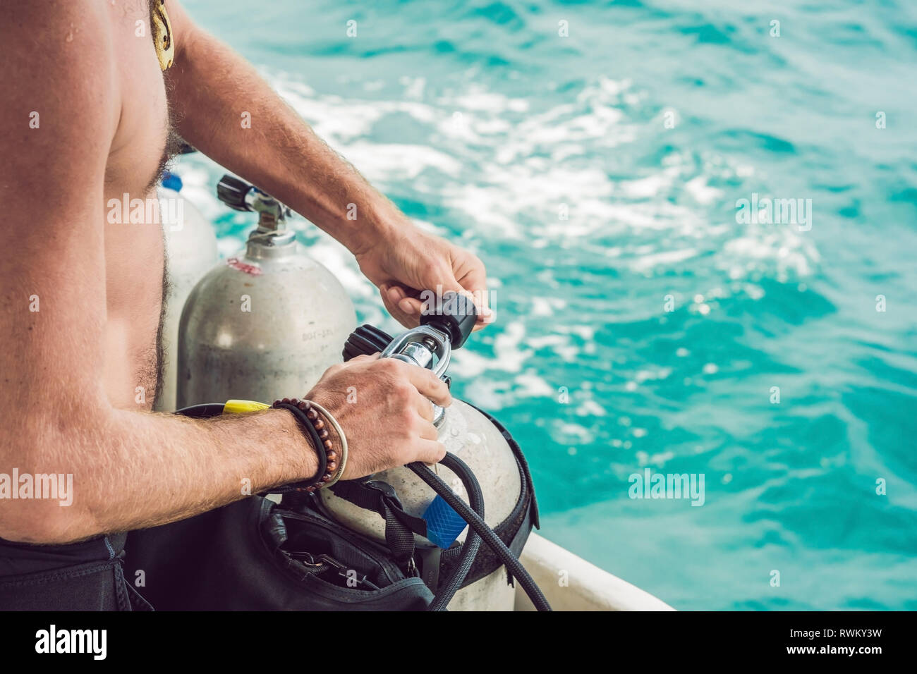 Diver prepares his equipment for diving in the sea Stock Photo - Alamy