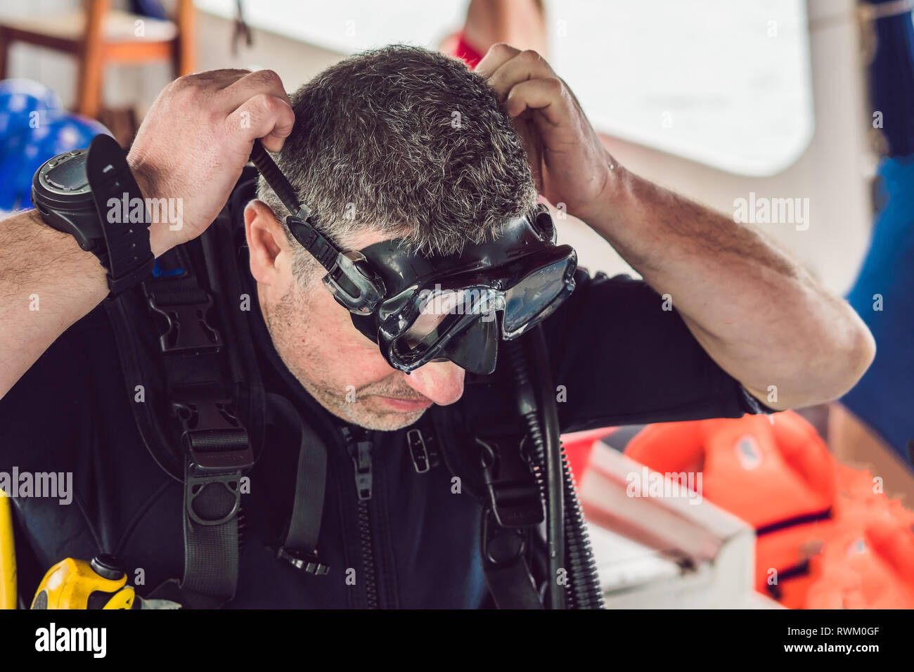 Diver preparing to dive into the sea Stock Photo - Alamy