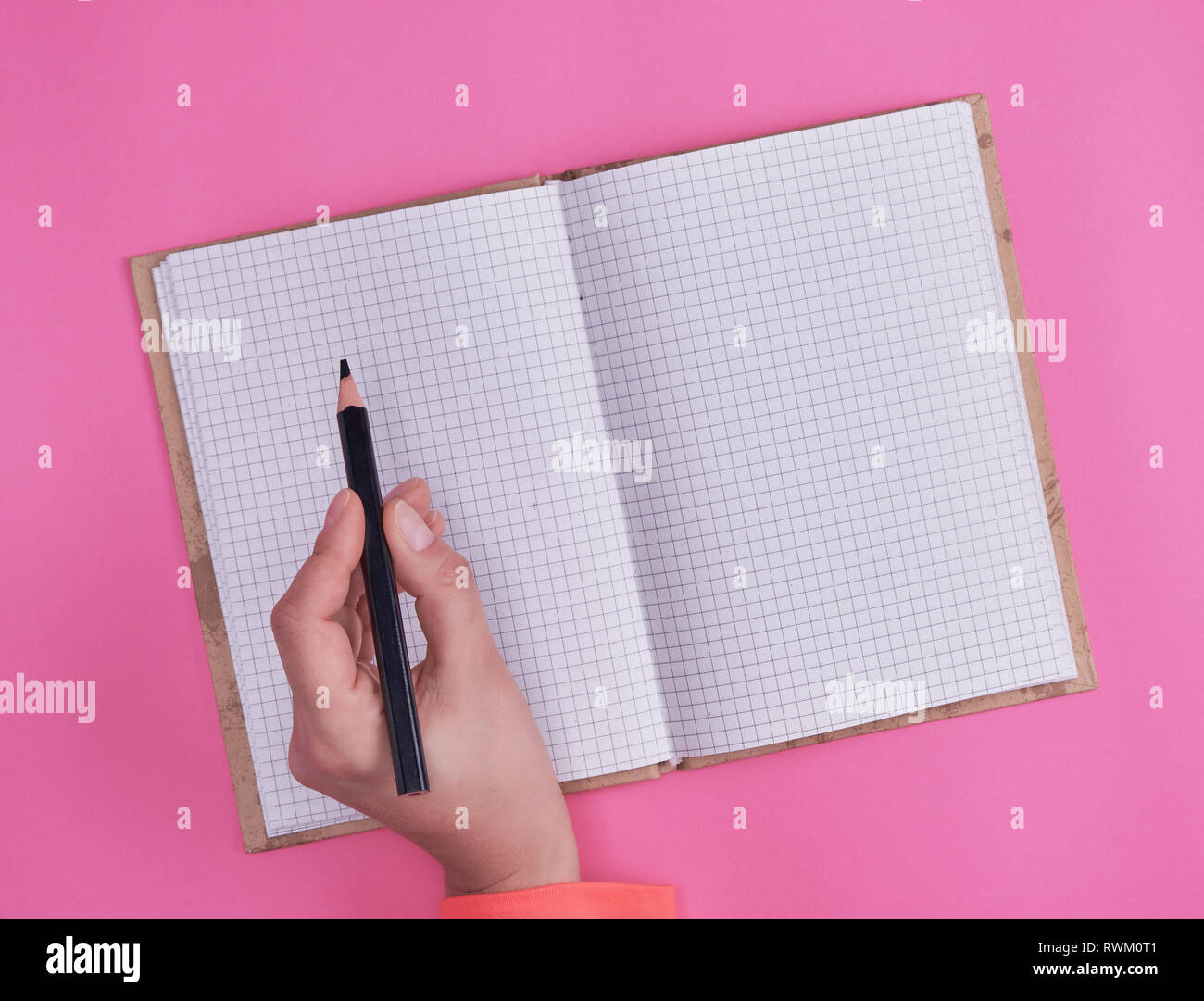 Human hand holding open book hi-res stock photography and images - Alamy