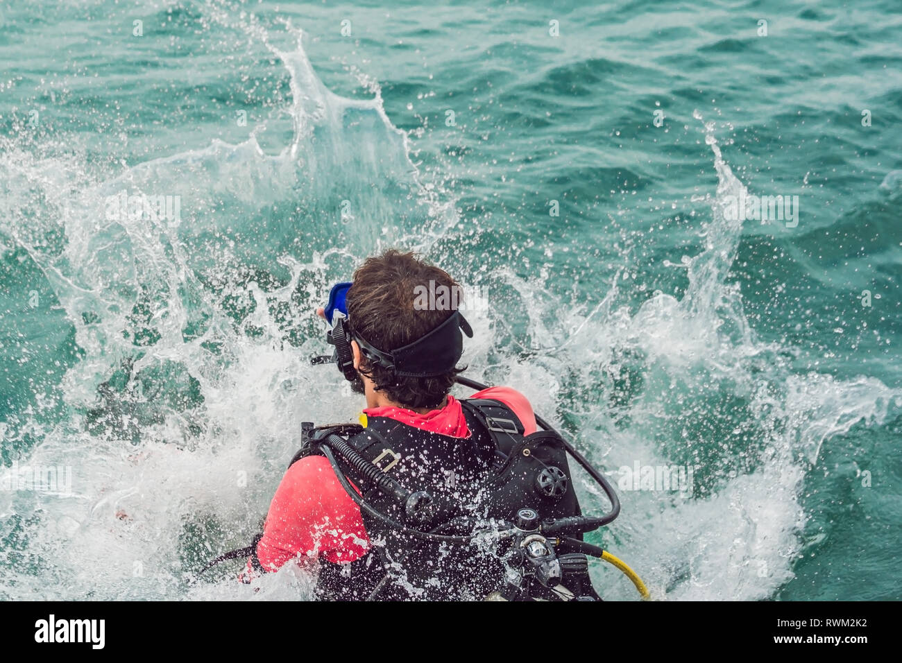 Jump in diving suit hi-res stock photography and images - Alamy