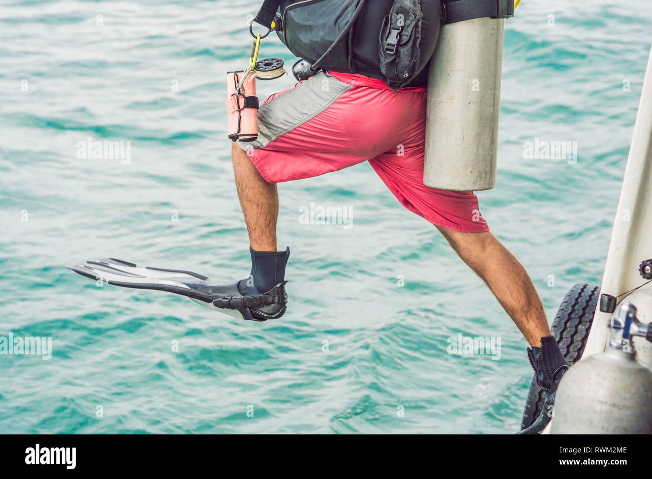 Jump in diving suit hi-res stock photography and images - Alamy