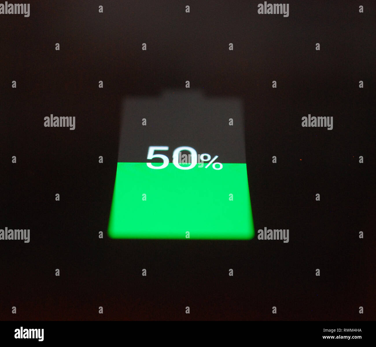 battery indicator level on a smartphone screen shallow dof image Stock ...