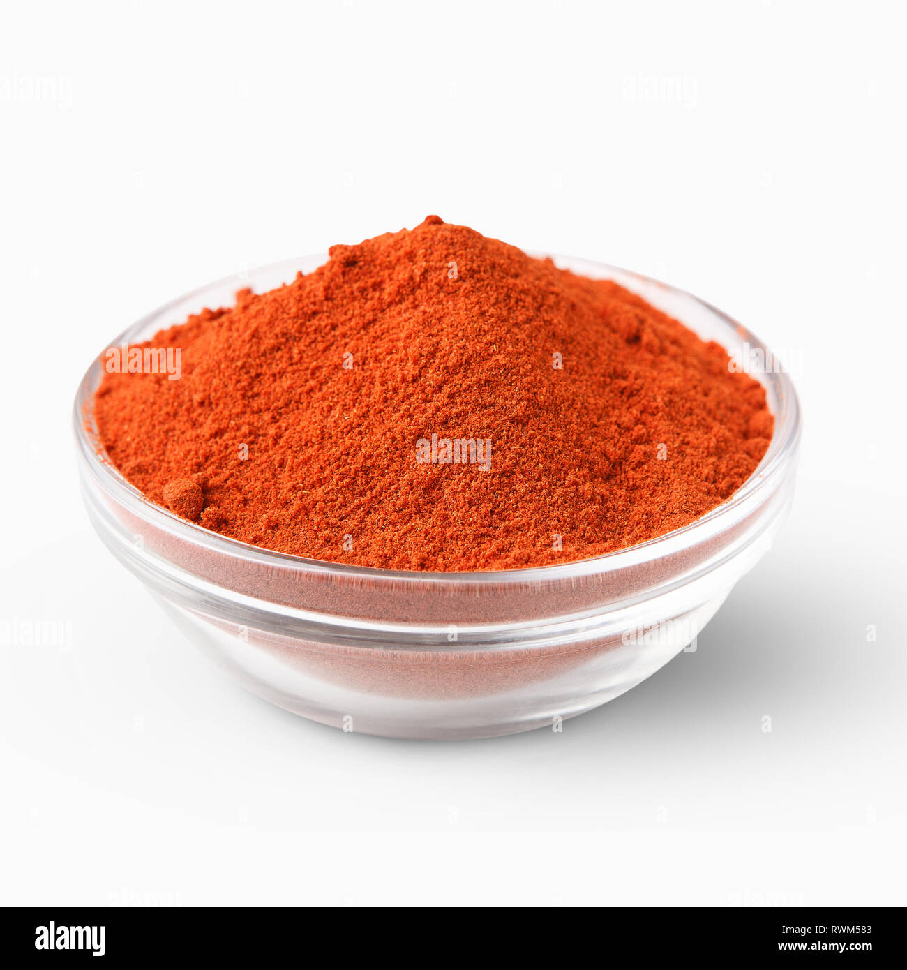 Red paprika powder isolated on white background Stock Photo - Alamy