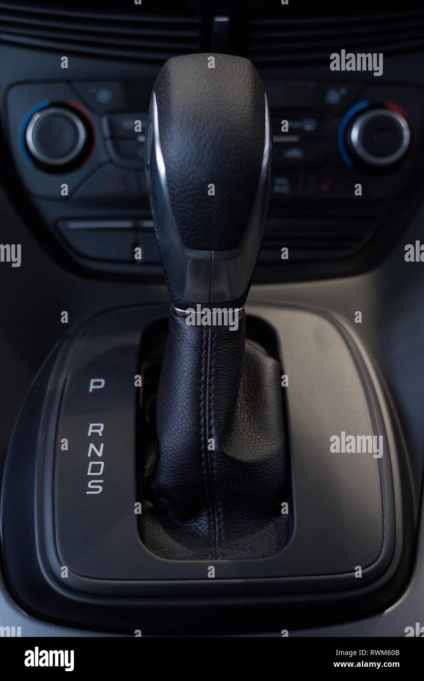 New modern car with automatic transmission at dealer showroom. Modern ...
