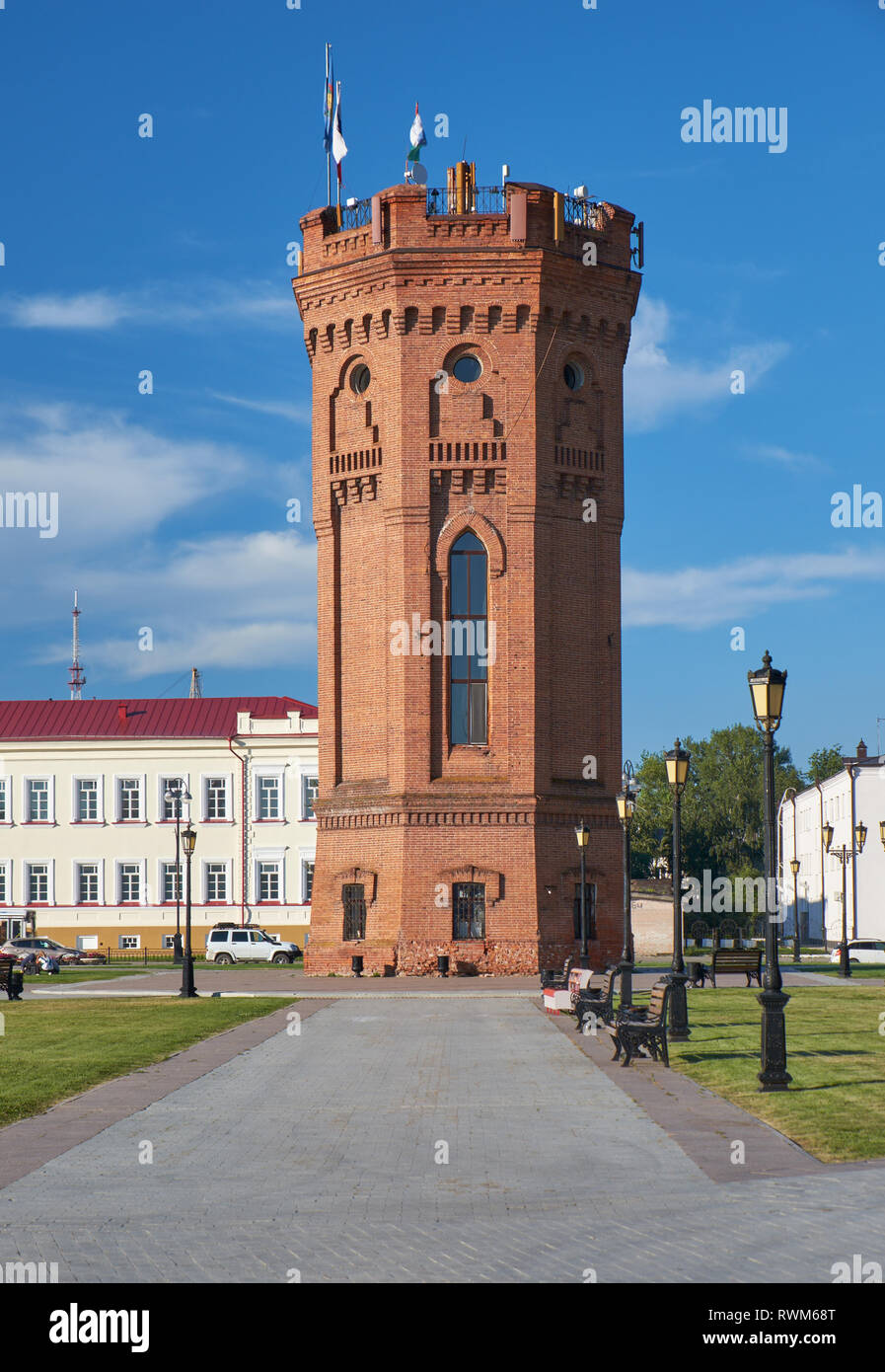 The view of red bricks Water tower on the Remezov Square. Tobolsk ...