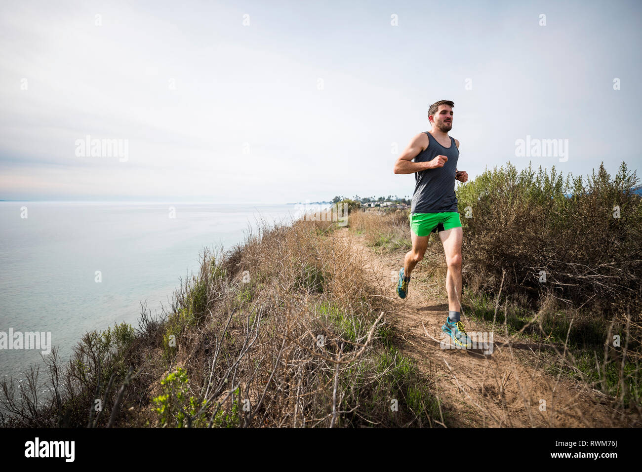 Man Running Cliff High Resolution Stock Photography and Images - Alamy
