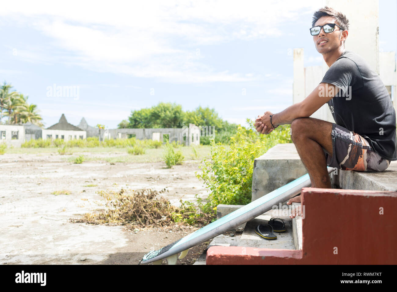 Man with surfboard, Abulug, Cagayan, Philippines Stock Photo - Alamy