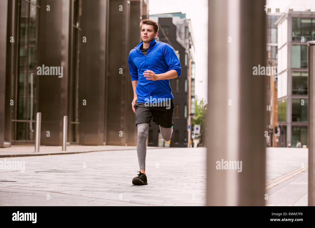 Jogging city man buildings hi-res stock photography and images - Alamy