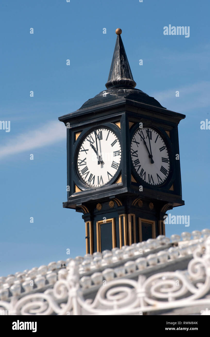 Clock at the entrance to Brighton Palace pier, in the coastal town of ...