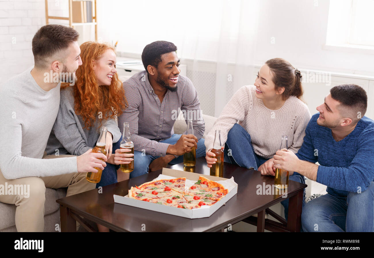 Diverse group people sitting couch hi-res stock photography and images ...
