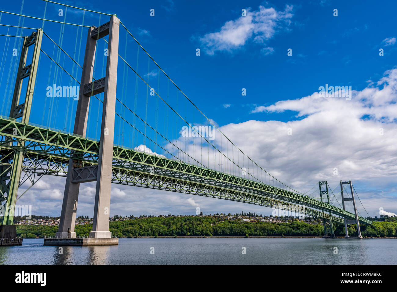 A view of the Tacoma Narrows Bridges from the water surface. The ...