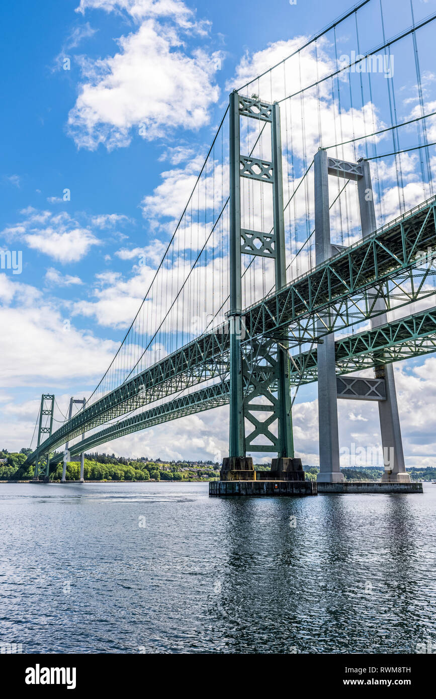A view of the Tacoma Narrows Bridges from the water surface. The ...