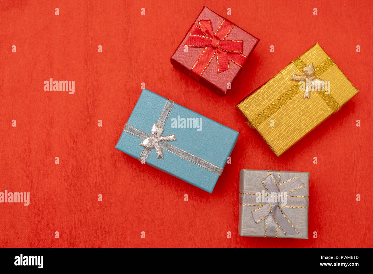 Bright gift boxes with bows Stock Photo - Alamy
