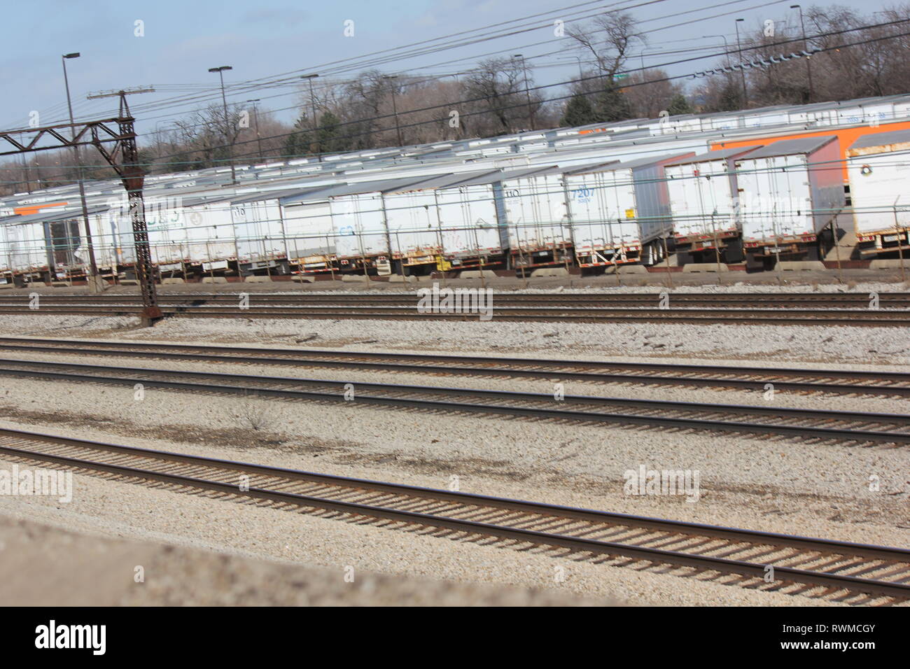 Railroad tracks and truck parking at the rail yard on the south side of ...