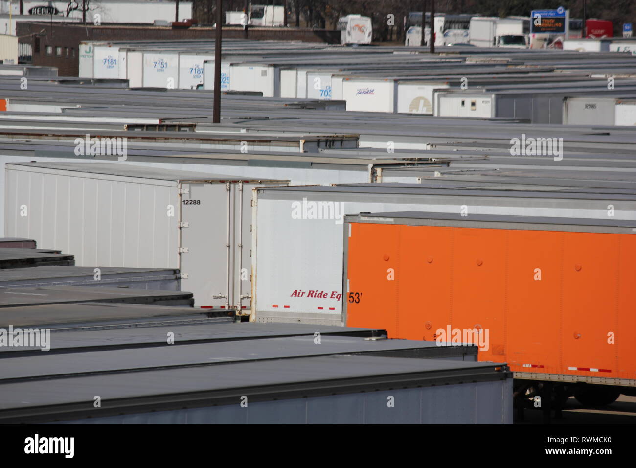 Truck parking lot loaded with parked trucks Stock Photo - Alamy