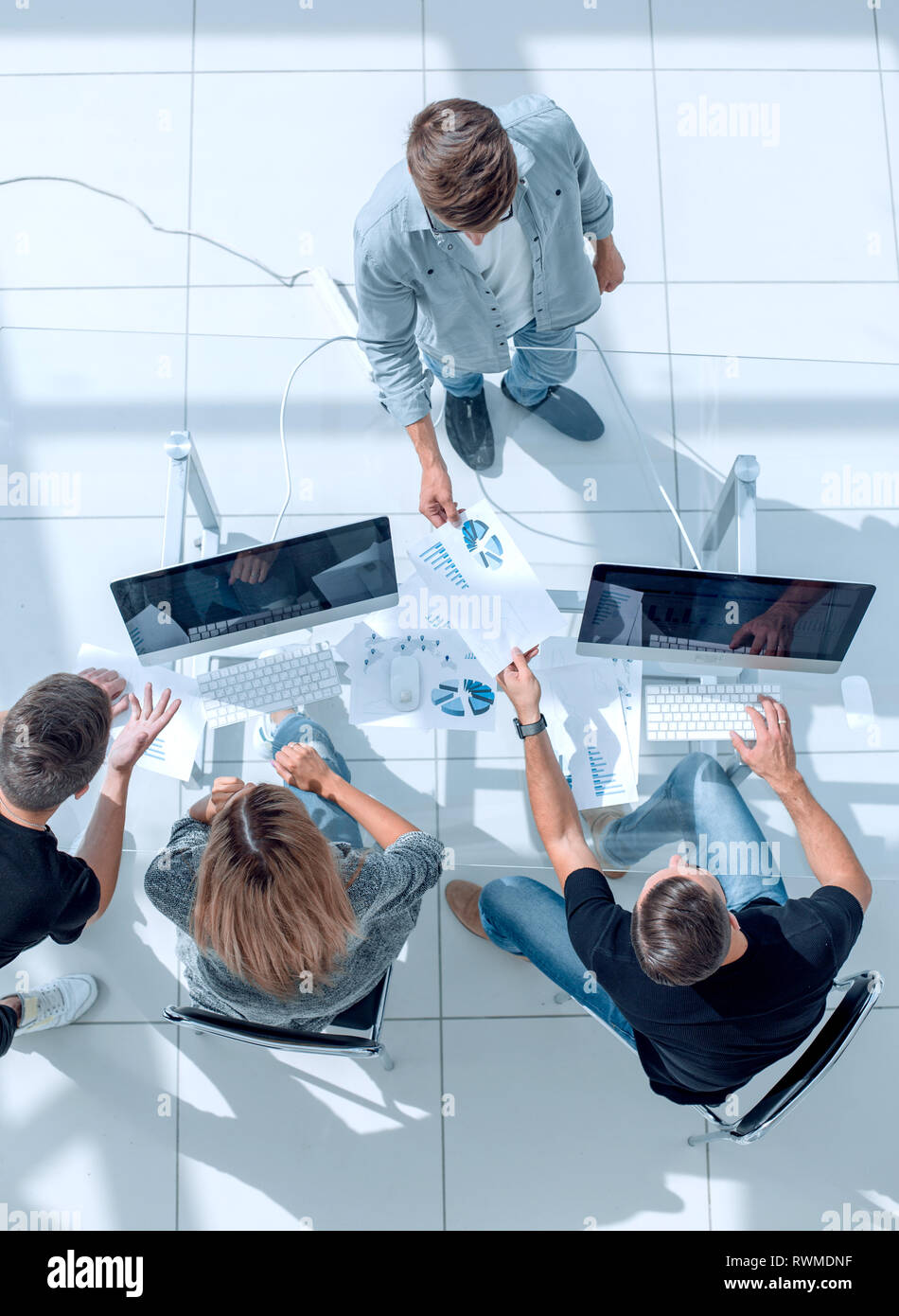 the manager gives the diagram to his management Stock Photo - Alamy