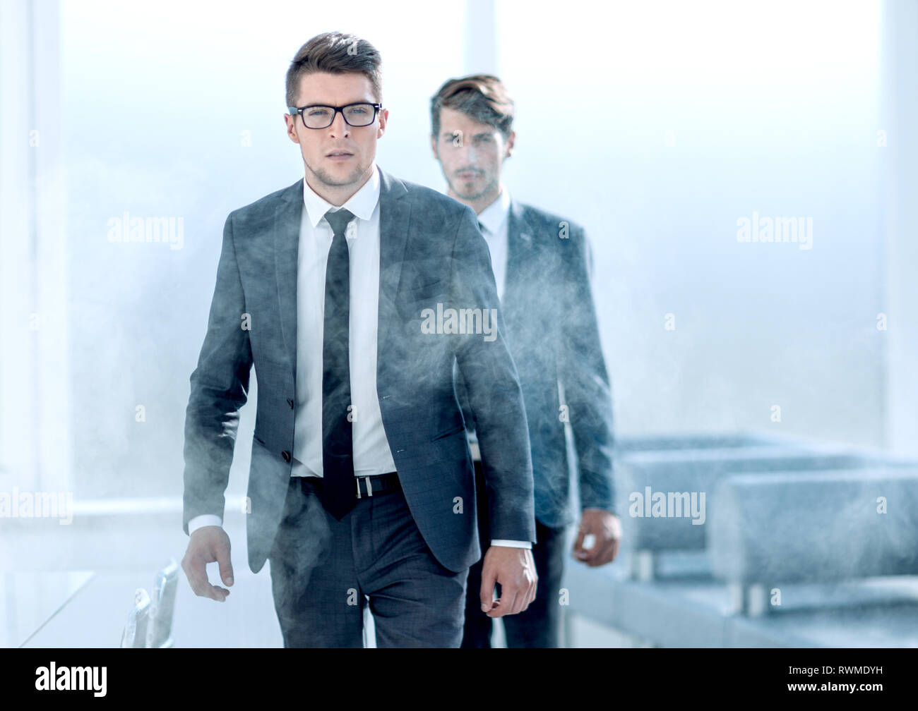 Businessman in office room smoke hi-res stock photography and images ...