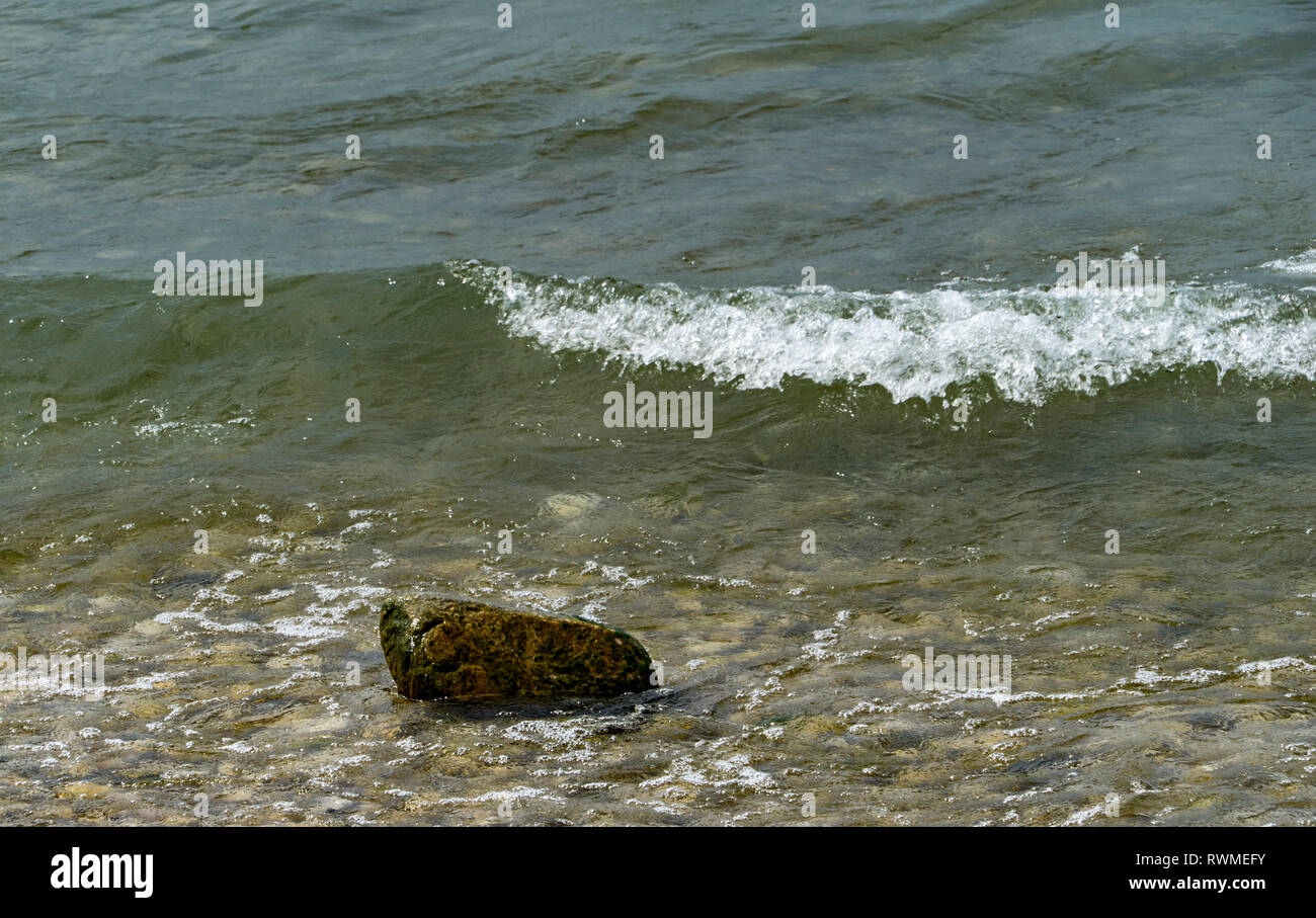 Rock & Wave Stock Photo - Alamy