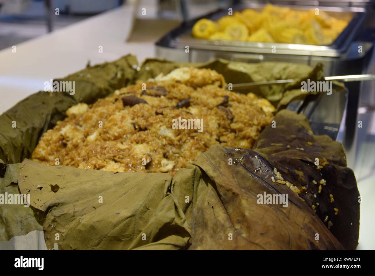 Buffet in chinese restaurant. Zongzi, traditional Chinese rice dish ...