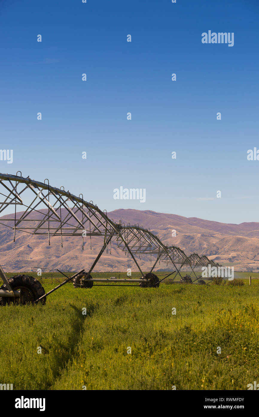 Irrigation system in use on a farm in South Island, New Zealand during ...