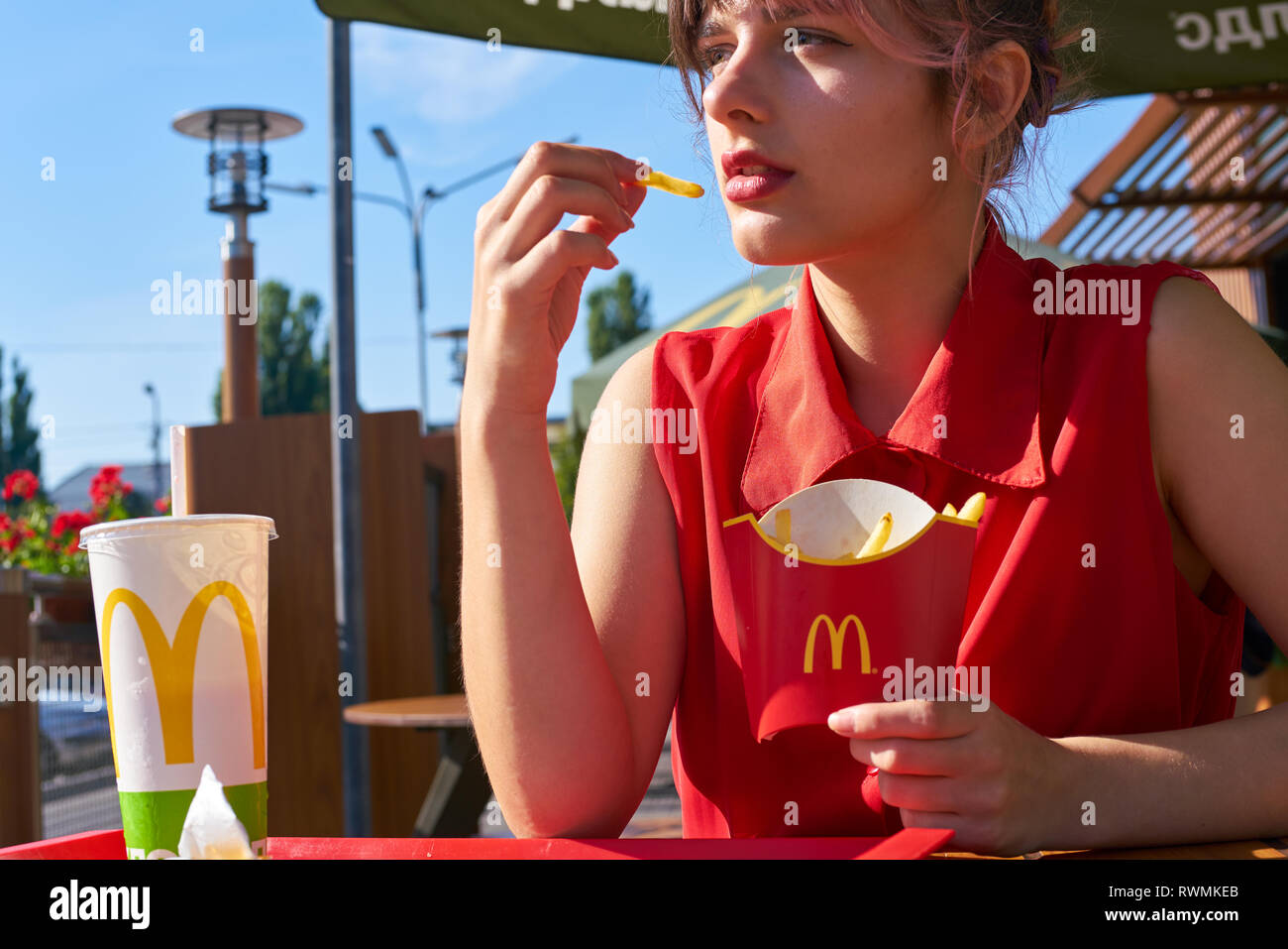 KALININGRAD, RUSSIA - CIRCA SEPTEMBER, 2018: young woman at McDonald's ...