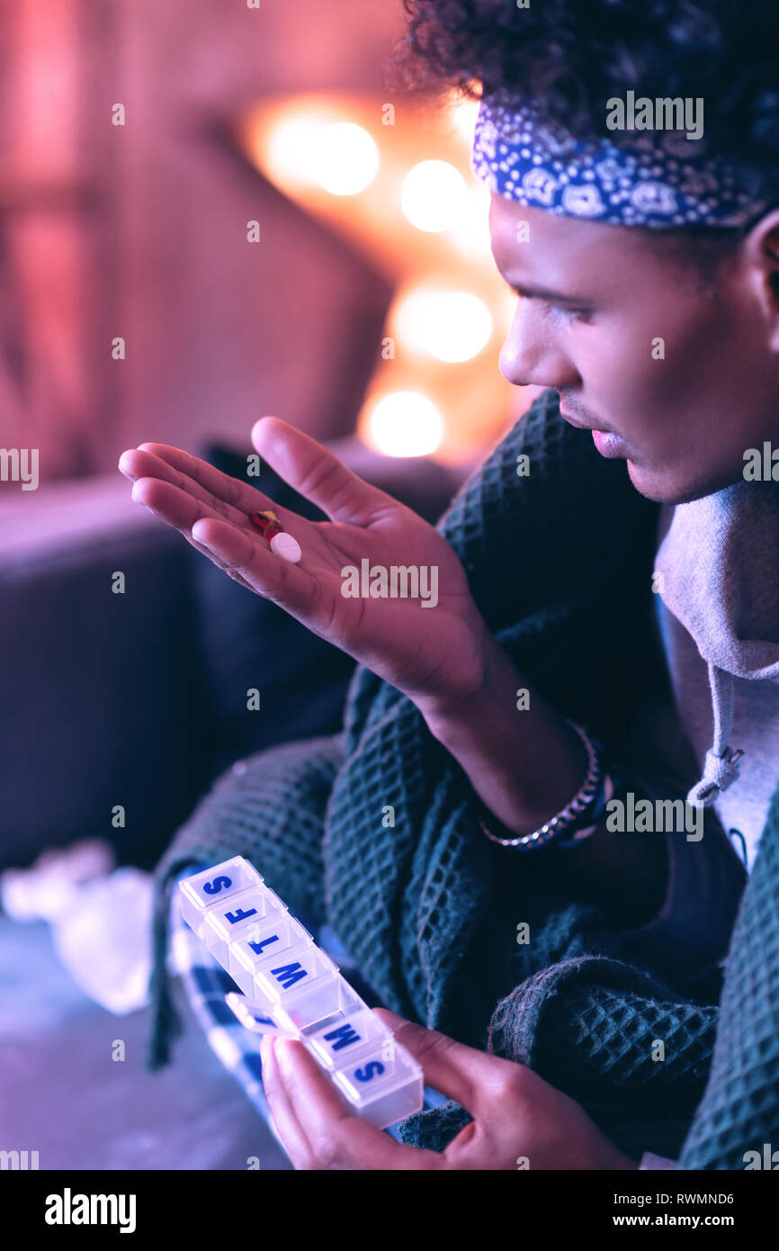 Boy taking vitamins hi-res stock photography and images - Alamy
