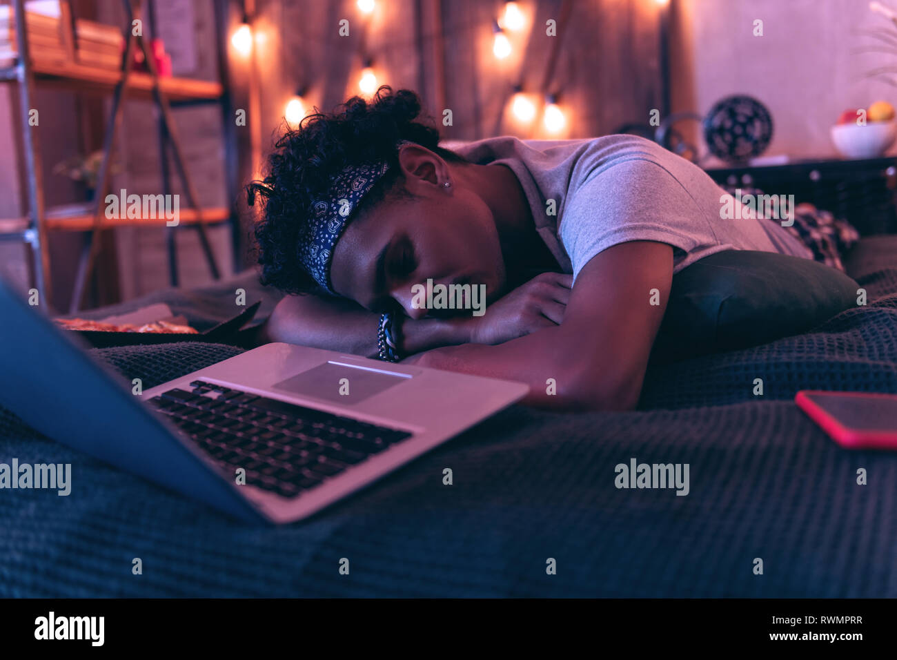Male teenager and laptop and bedroom hi-res stock photography and ...