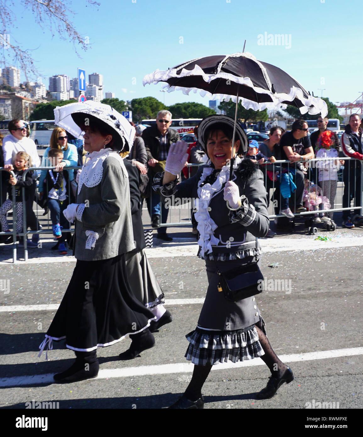 Rijeka, Croatia, March 3rd, 2019. A lady walking in a carnival parade ...