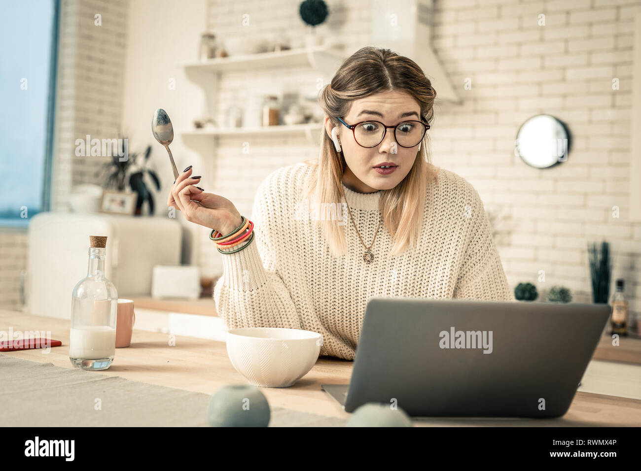 Shocked Lady In Clear Glasses Looking On Laptop With Widely Opened Eyes 8582