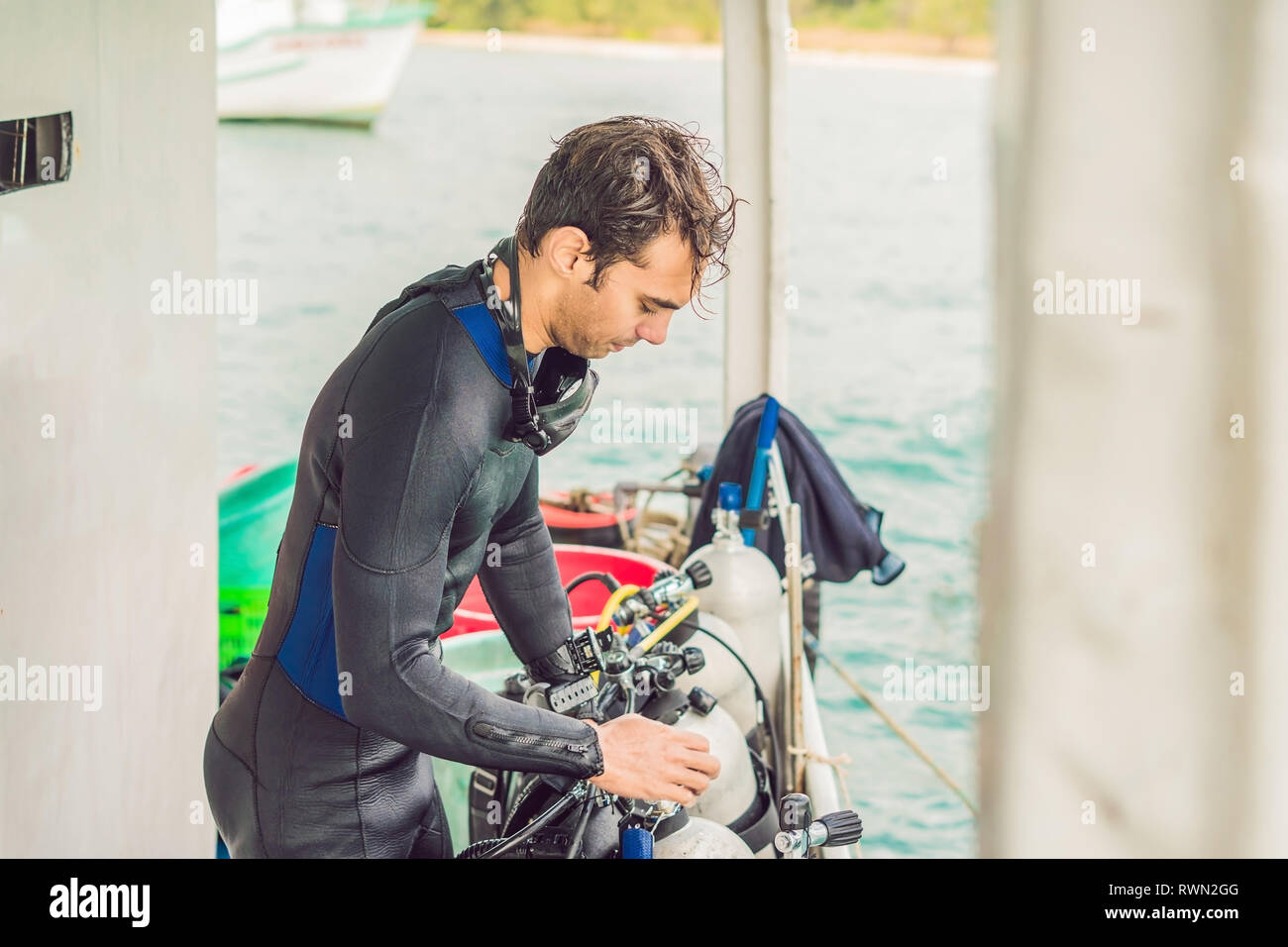 Diver preparing to dive into the sea Stock Photo - Alamy