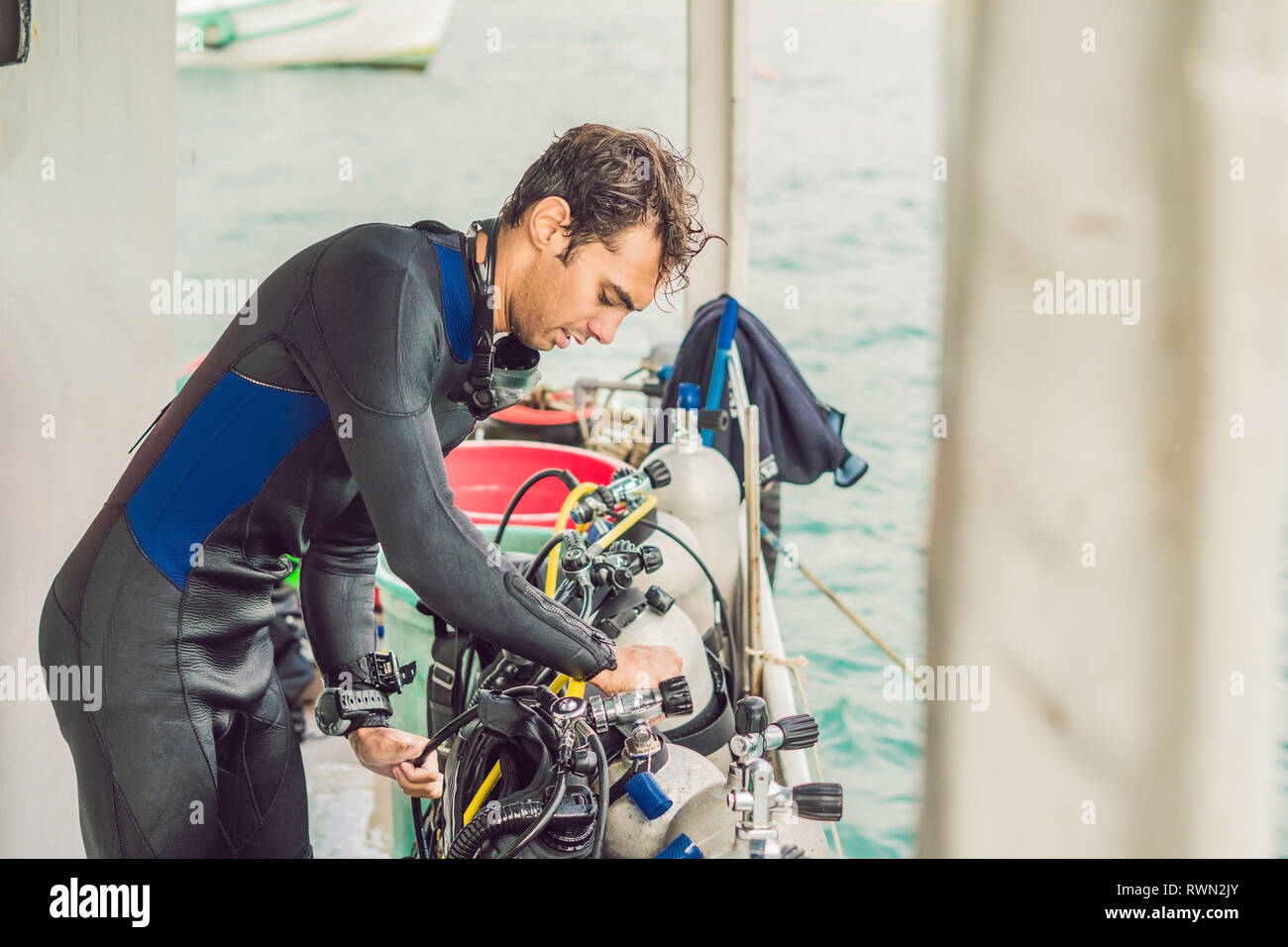 Diver preparing to dive into the sea Stock Photo - Alamy