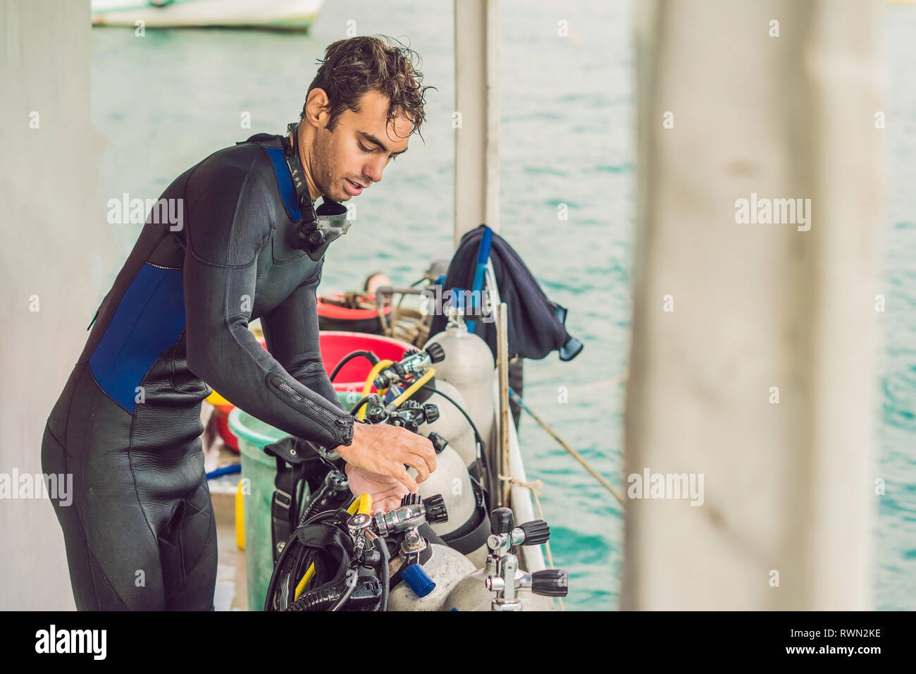 Diver preparing to dive into the sea Stock Photo - Alamy