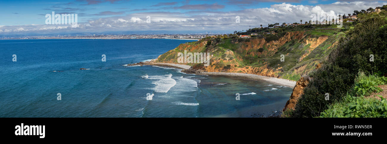 Vivid Southern California coastal view of tall, grass covered cliffs of ...