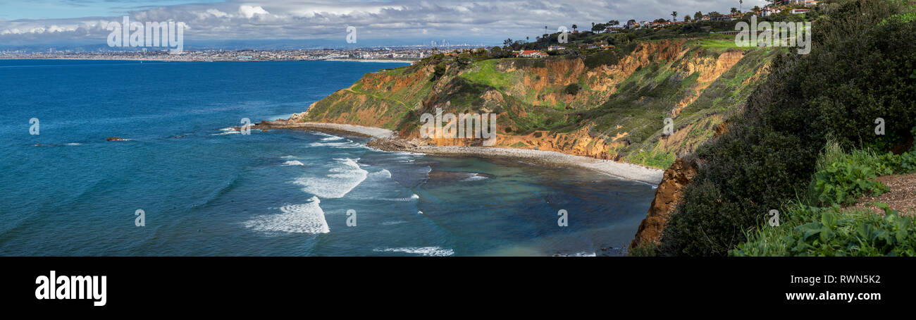 Vivid Southern California coastal view of tall, grass covered cliffs of ...