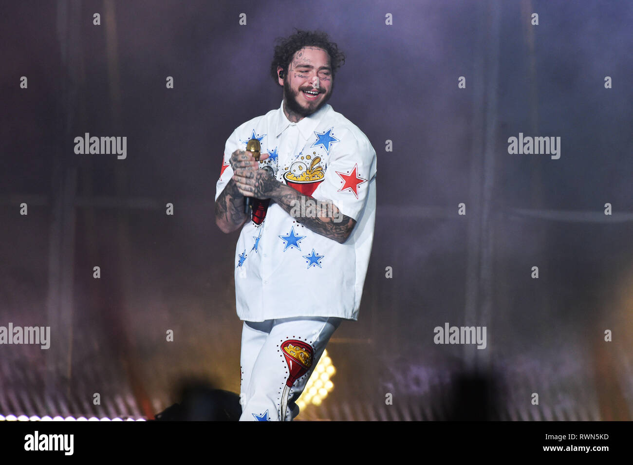 Post Malone performs during the Bud Light Super Bowl LIII Music Fest at ...