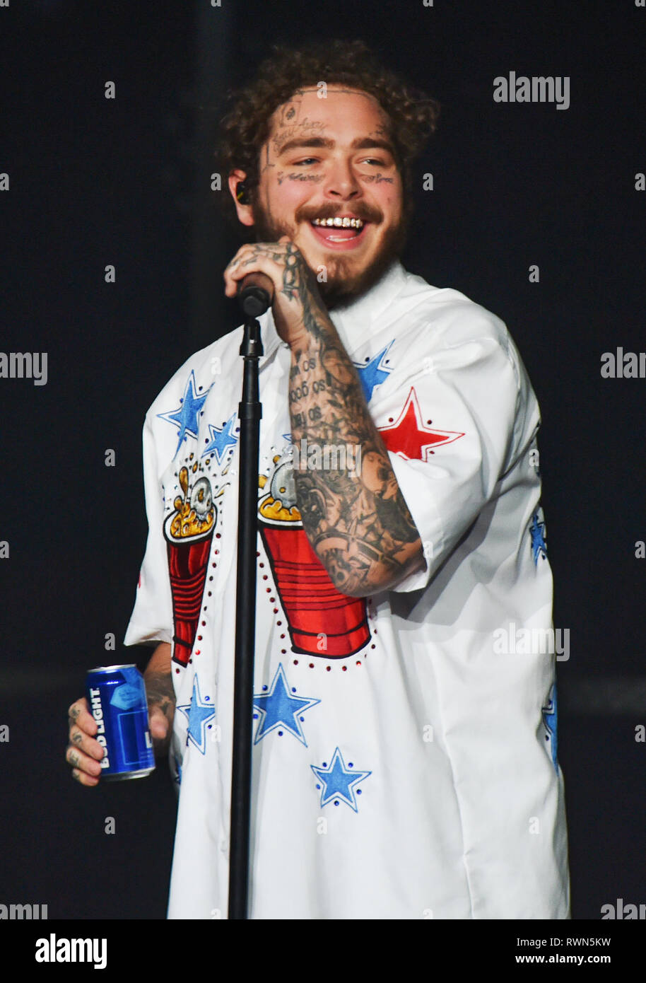 Post Malone performs during the Bud Light Super Bowl LIII Music Fest at ...