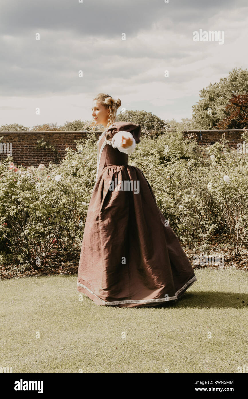 Pretty woman at hampton court garden hi-res stock photography and ...