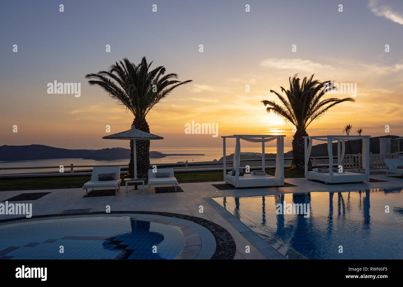 Santorini, Cyclades islands / Greece - 16 May 2018: swimming pools in a ...