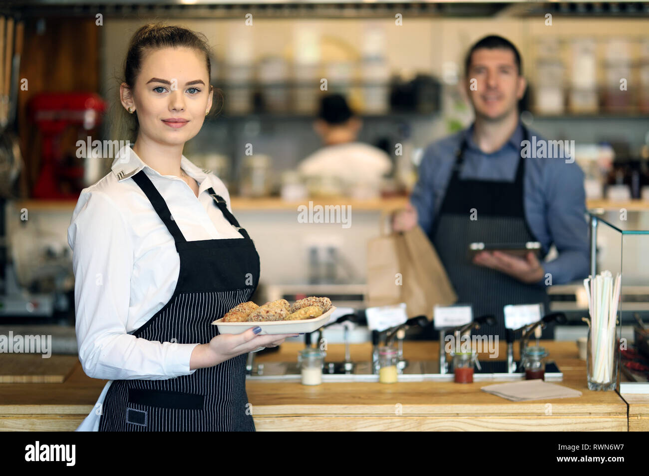 Working at the restaurant hi-res stock photography and images - Alamy