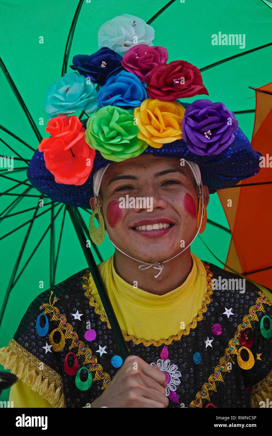 Folkloric dancers wearing the traditional indigenous attire of the ...