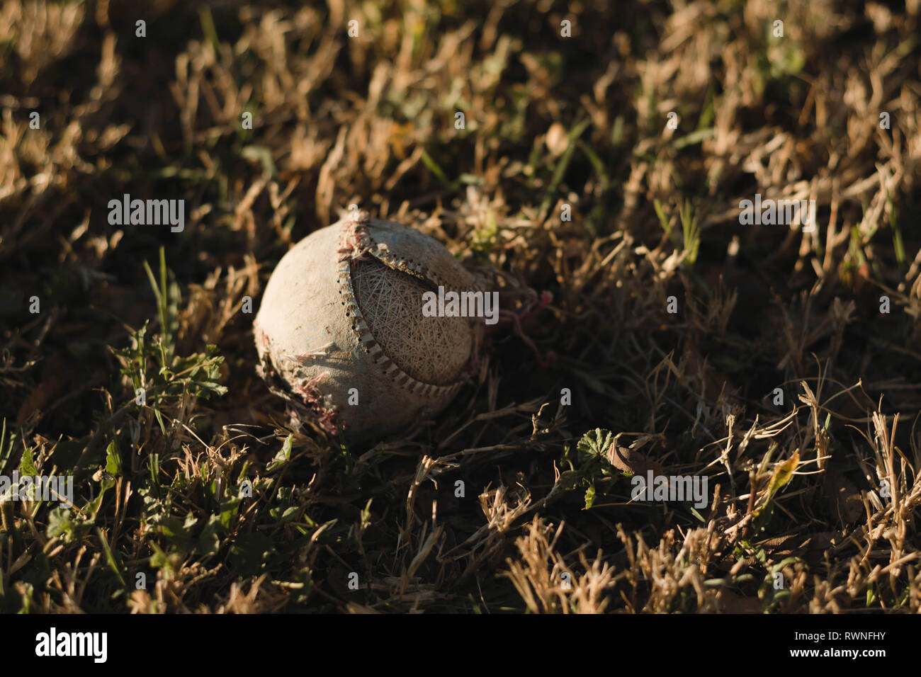Old Torn Baseball Stock Photo - Alamy