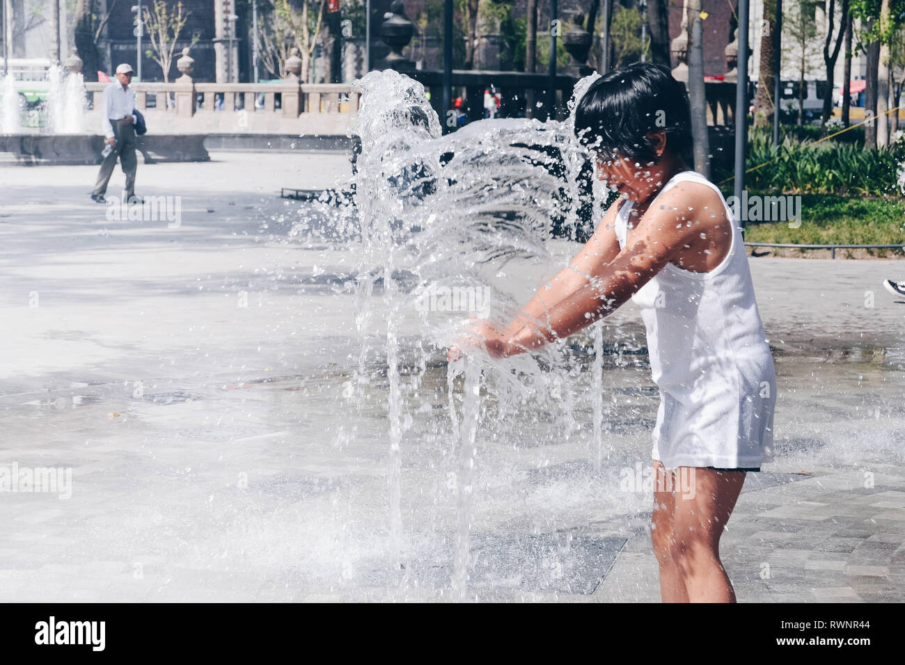 Fountain girl soaking wet hi-res stock photography and images - Alamy